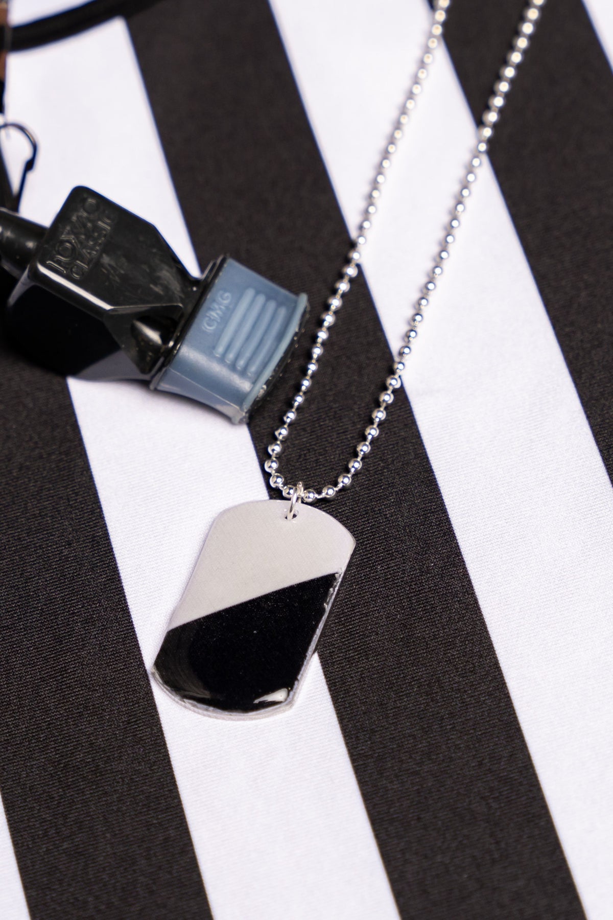 Blocker Dog Tag – Rebel Nell